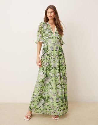 Hope & Ivy Robe longue fendue sur la cuisse avec manches &agrave; volants et d&eacute;coupe au dos - Vert fleuri