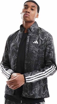 adidas adidas Running - Own The Run - Laufjacke in Schwarz mit durchg&auml;ngigem Print
