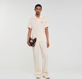 Sandro Poloshirt mit Leder-Logo