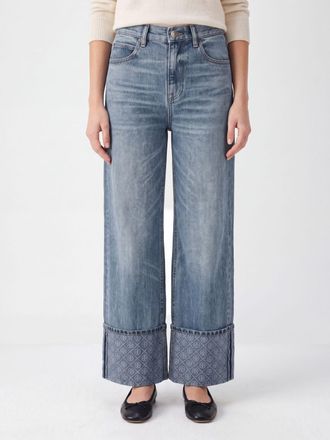 Tory Burch Jean large en denim avec monogramme Double T et revers