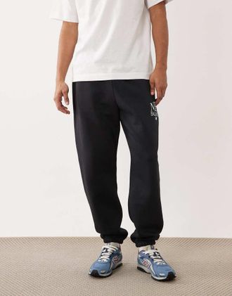 New Balance Reimagined - Pantalon de jogging en polaire - Noir