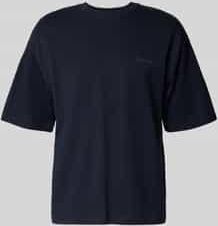 Review Oversized T-Shirt mit Logo