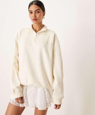 adidas Originals Sweat-shirt &agrave; col zipp&eacute; et logo lin&eacute;aire - Cr&egrave;me-Blanc