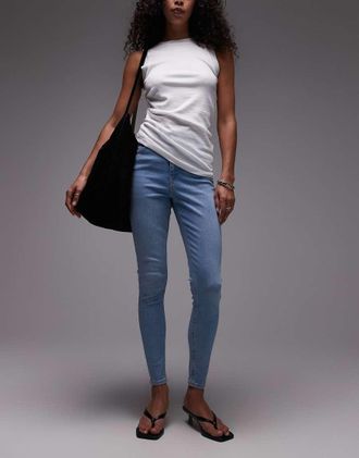 Topshop Jamie - Skinny-Jeans in Bleach-Waschung mit hohem Bund-Blau