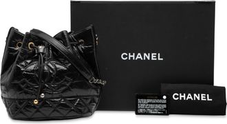 Chanel Black Shiny Aged Calfskin CC Chain Drawstring Bucket Bag