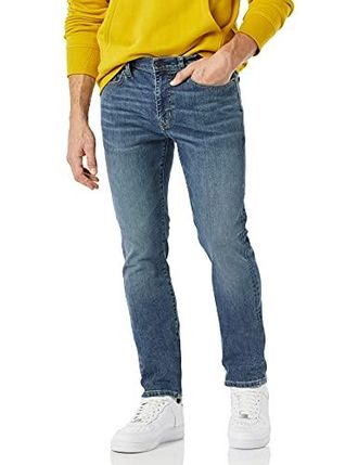 Amazon Essentials Jean Ultra Extensible, Coupe cintrée Homme, Délavé Moyen, 38W / 29L