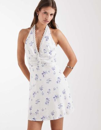Kiss The Sky Positano - Minikleid in Wei&szlig;-Blau mit Leinenoptik und Blumenmuster