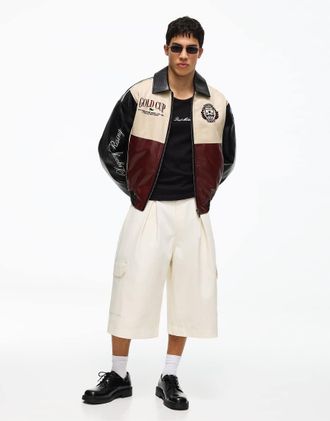 Bershka Veste imitation cuir &agrave; imprim&eacute; graphique - Noir