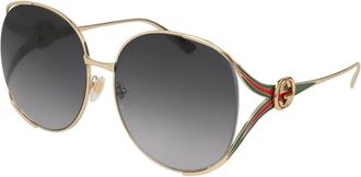 Gucci Oversize runde Metallsonnenbrille mit ikonischen Details - - Accessories - unisex - Gelb - ONE SIZE