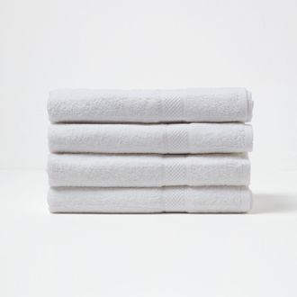 Homescapes 4er Set Flauschiges Premium Frottee Duschtuch ca. 70 x 130 cm aus 100% T&uuml;rkischer Baumwolle, Wei&szlig;