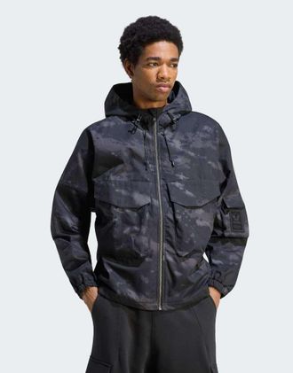 adidas Originals Jacke mit Military-Muster in Schwarz