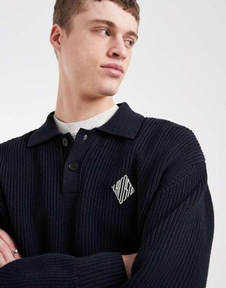 Lacoste Strickpullover in Schwarz mit Polokragen und rautenf&ouml;rmigem Logo