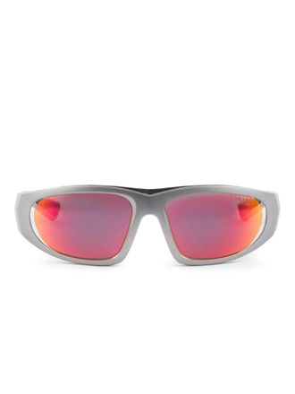 Prada lunettes de soleil Linea Rossa &agrave; monture ovale - Gris
