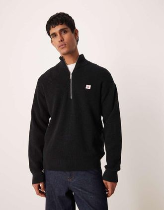 Calvin Klein Jeans Pullover in Schwarz mit kurzem Rei&szlig;verschluss und Waffelstruktur