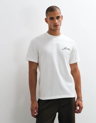 Lacoste t-shirt &agrave; manches courtes brod&eacute; avec inscription en blanc