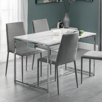 Julian Bowen Der Julian Bowen Scala Esstisch aus wei&szlig;em Marmor und Chrom ist ein elegantes und modernes Herzst&uuml;ck f&uuml;r dein Esszimmer