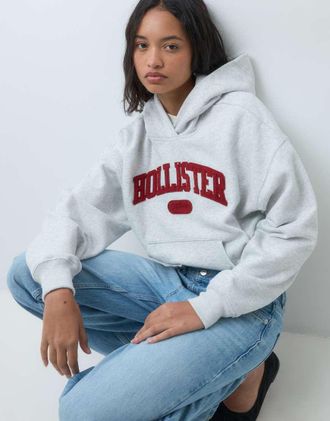 Hollister Oversize-Kapuzenpullover mit Logo vorn in meliertem Grau