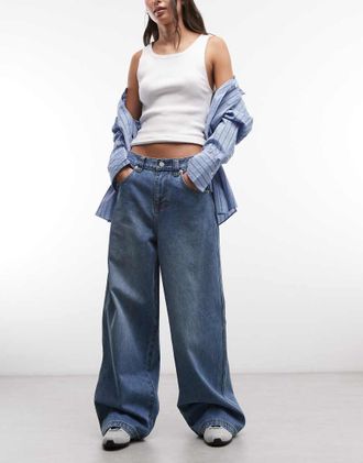 The Ragged Priest Weite Jeans in Dunkelblau mit niedrigem Bund und Schnalle hinten