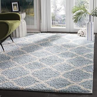 Safavieh Zottelig Teppich für Wohnzimmer, Esszimmer, Schlafzimmer - New York Shag Collection, Hoher Flor, Blau und Elfenbein, 155 X 229 cm