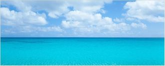Wallario Poster - Sandstrand und blaues Meer in Premiumqualität, Größe: 80 x 200 cm XXL-Poster