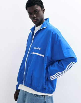adidas Originals Signature Firebird Relaxed-Trainingsjacke in Blau