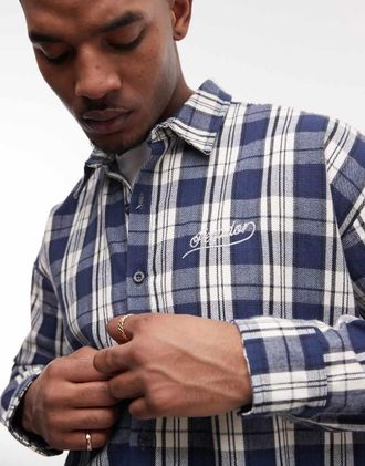 Pegador Pegador - Soglio - Chemise oversize en flanelle &agrave; carreaux avec imprim&eacute; au dos - Bleu twilight