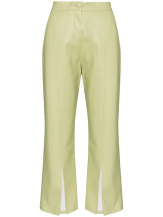 Mat&eacute;riel pantalon crop &eacute;vas&eacute; en cuir artificiel - Vert