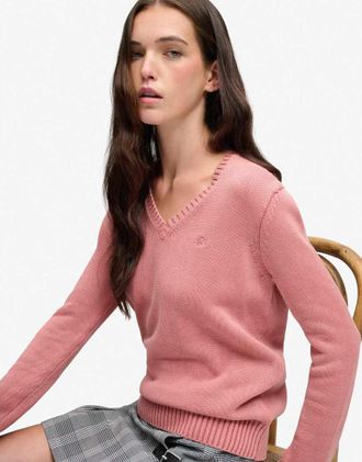 Superdry pull col V d&eacute;lav&eacute; en rose fan&eacute;