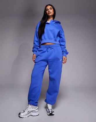Nike Phoenix Fleece - Pantalon de jogging oversize &agrave; chevilles resserr&eacute;es et taille haute - Bleu