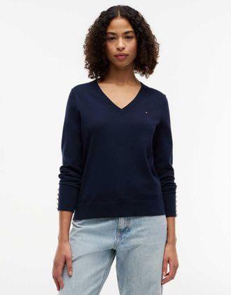 Tommy Hilfiger Pullover in Dunkelblau mit V-Ausschnitt und goldfarbenen Kn&ouml;pfen an den B&uuml;ndchen