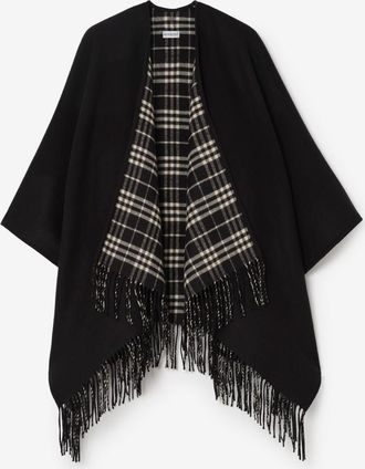 Burberry Cape r&eacute;versible en laine Check
