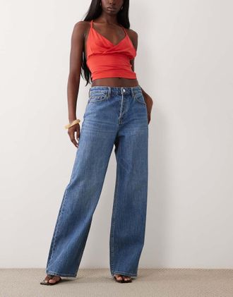 Good American Vintage-Jeans in mittelblauer Waschung mit hohem Bund und weitem Bein