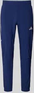 adidas Slim Fit Sweatpants mit Logo-Print Modell Tech
