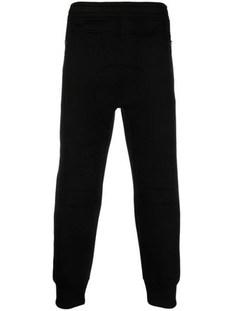 Neil Barrett pantalon de jogging &agrave; coupe sarouel - Noir