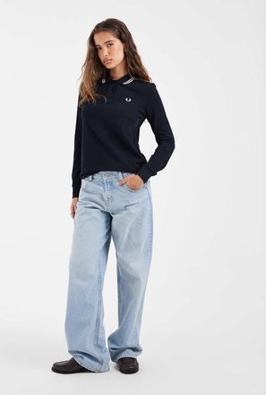 Fred Perry polo &agrave; manches longues &agrave; double liser&eacute; bleu marine avec liser&eacute;s roses
