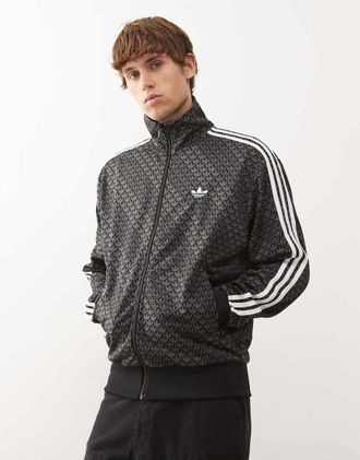 adidas Originals Firebird - Loose-Fit-Trainingsjacke in Schwarz mit Monogramm-Muster