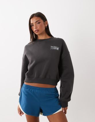 New Balance sweat-shirt polaire &agrave; col rond Trackside noir ciment-Gris