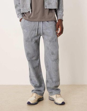 Abercrombie & Fitch Pantalon de jogging baggy basique &agrave; ourlet ouvert et imprim&eacute; camouflage - Bleu