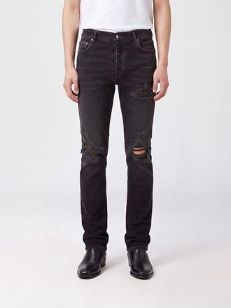 Amiri Jean skinny fit en denim vieilli &agrave; effet us&eacute;