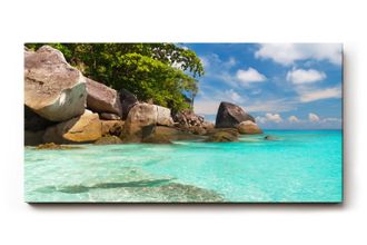 Paul Sinus Art Sinus Art Wandbild 100x50cm Feinsandiger Strand mit Felsen und t&uuml;rkisfarbenem Wasser - paradiesisch und entspannend