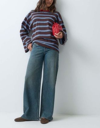 Hollister jean super baggy taille ultra basse en d&eacute;lavage bleu us&eacute;