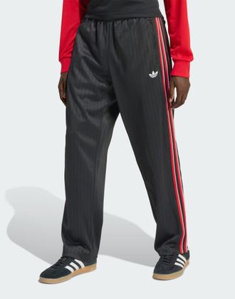 adidas Originals Firebird - Pantalon de surv&ecirc;tement ample &agrave; rayures fines - Noir
