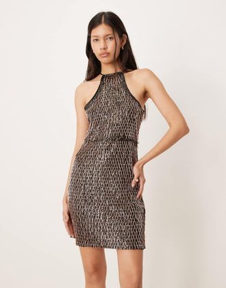 Amy Lynn Minikleid in Schwarz und Gold mit welligen Pailletten und Aussparung