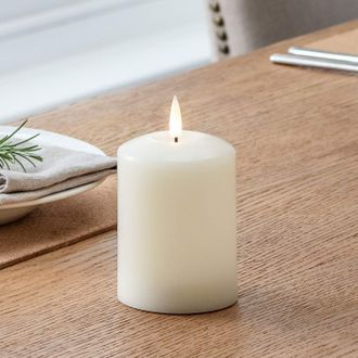 Lights4fun 2x TruGlow LED Echtwachskerzen mit warmweißer LED Flamme 10cm batteriebetrieb