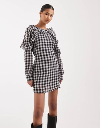 Vero Moda Robe courte &agrave; carreaux vichy et volants avec manches longues - Noir et blanc