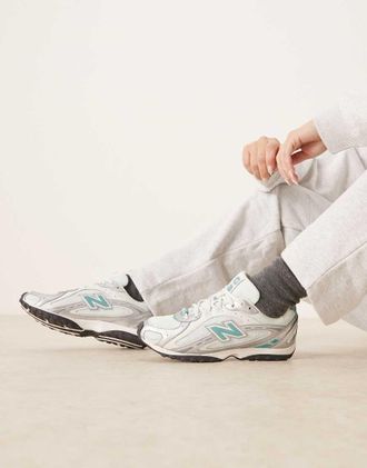 New Balance 204L - Sneaker in Metallic-Silber und Blau