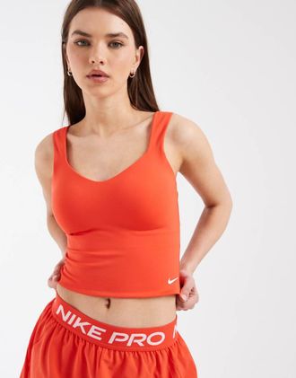 Nike Pro - D&eacute;bardeur style brassi&egrave;re de sport longue en tissu Dri-FIT - Rouge