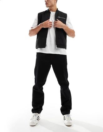 Carhartt Work in Progress Master - Locker geschnittene Hose in Schwarz