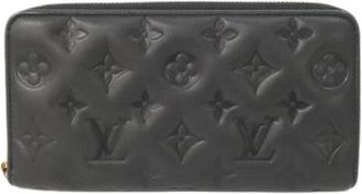Louis Vuitton Portefeuille long pr&eacute;-poss&eacute;d&eacute; Coussin en cuir dagneau - Femme - Pre-owned - Noir - Taille: ONE Size