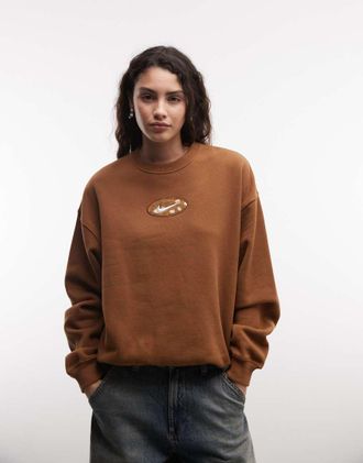 Nike Studio Fleece Oversize-Sweatshirt mit Grafikprint in Braun